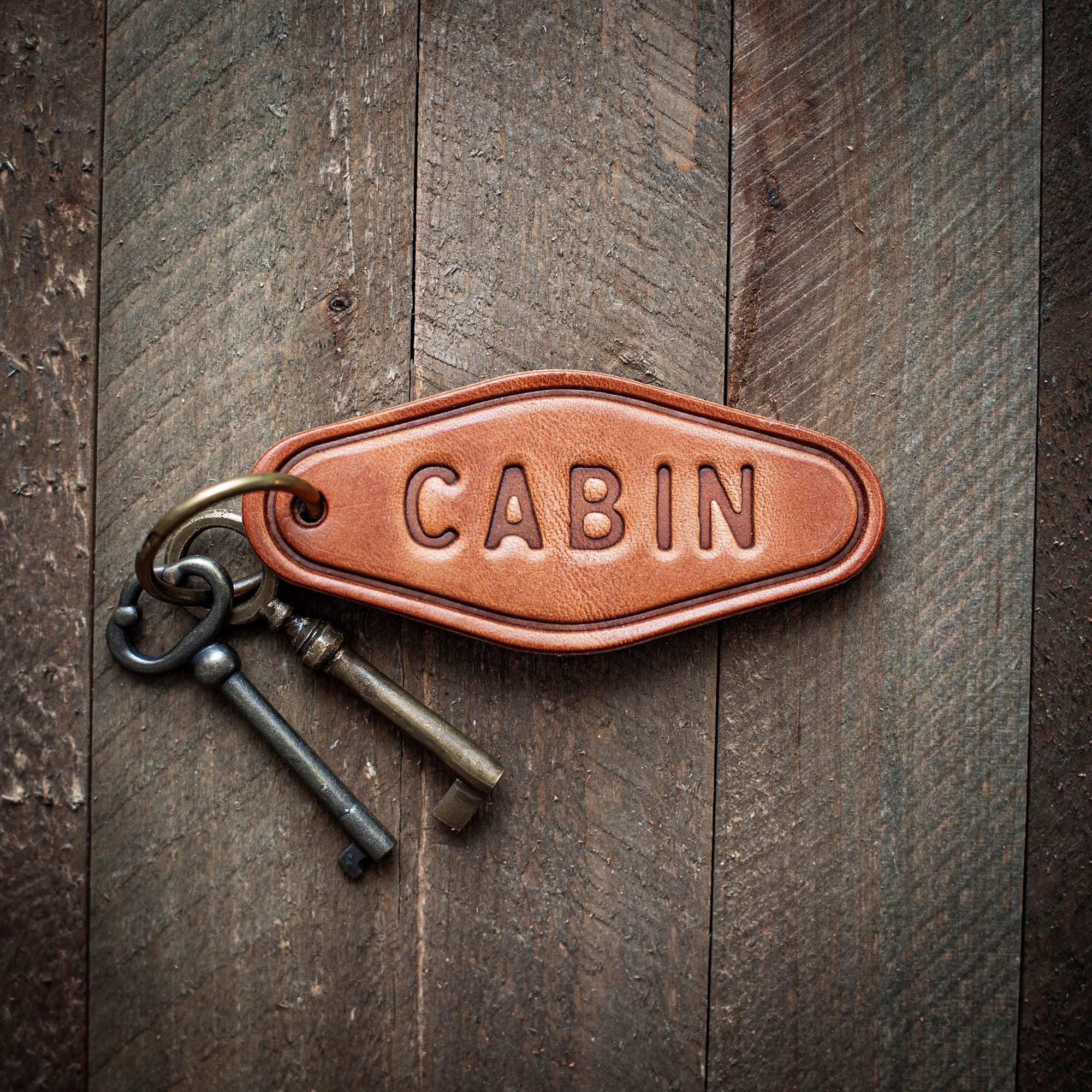 Cabin | Handmade Leather Keychain – Feather + Larch